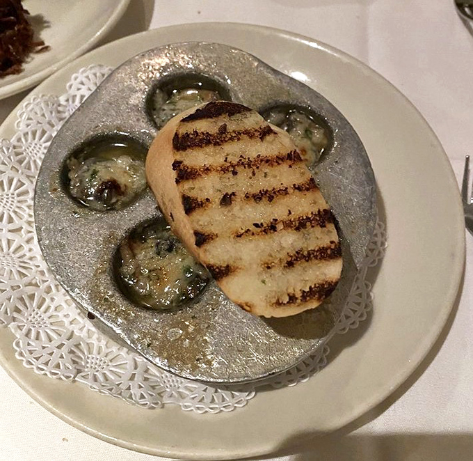 These escargot aren't just dinner—they're little buttery vessels of garlic-infused decadence that would make Julia Child give a standing ovation.