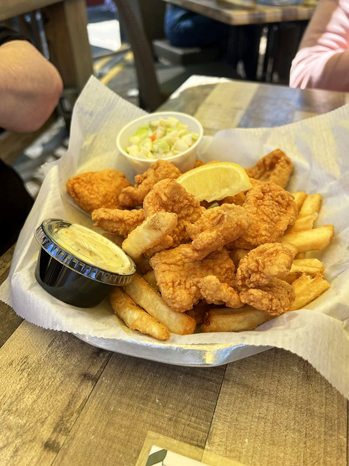 Golden-fried seafood and crispy fries – the kind of basket that makes you forget all about counting calories and remember what vacation tastes like.