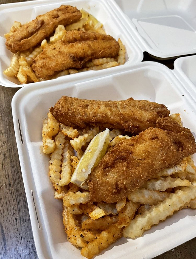 Proof that Wisconsin knows more than cheese – these golden-crusted fish fillets atop crinkle fries show Beef Butter BBQ respects Friday traditions as much as weekend smoke sessions.