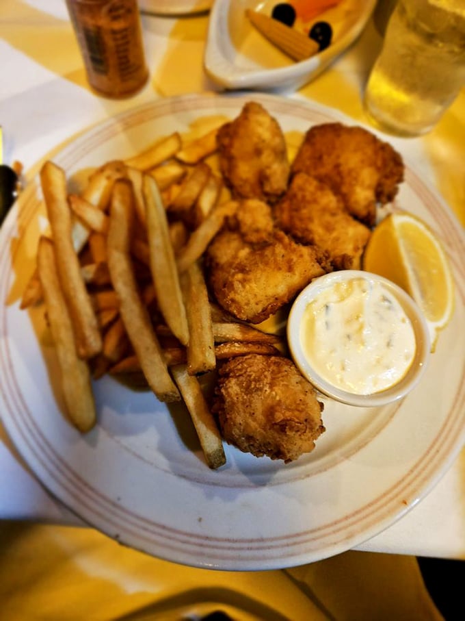 Even the seafood options refuse to be overshadowed at this steakhouse – golden-battered fish with fries so perfectly crisp they deserve their own fan club.