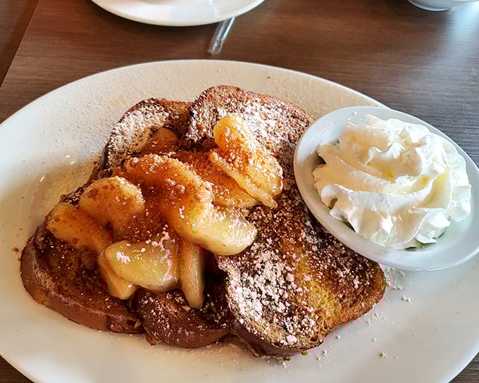 This French toast with caramelized bananas isn't just breakfast—it's what Elvis would have eaten if he'd been a morning person.