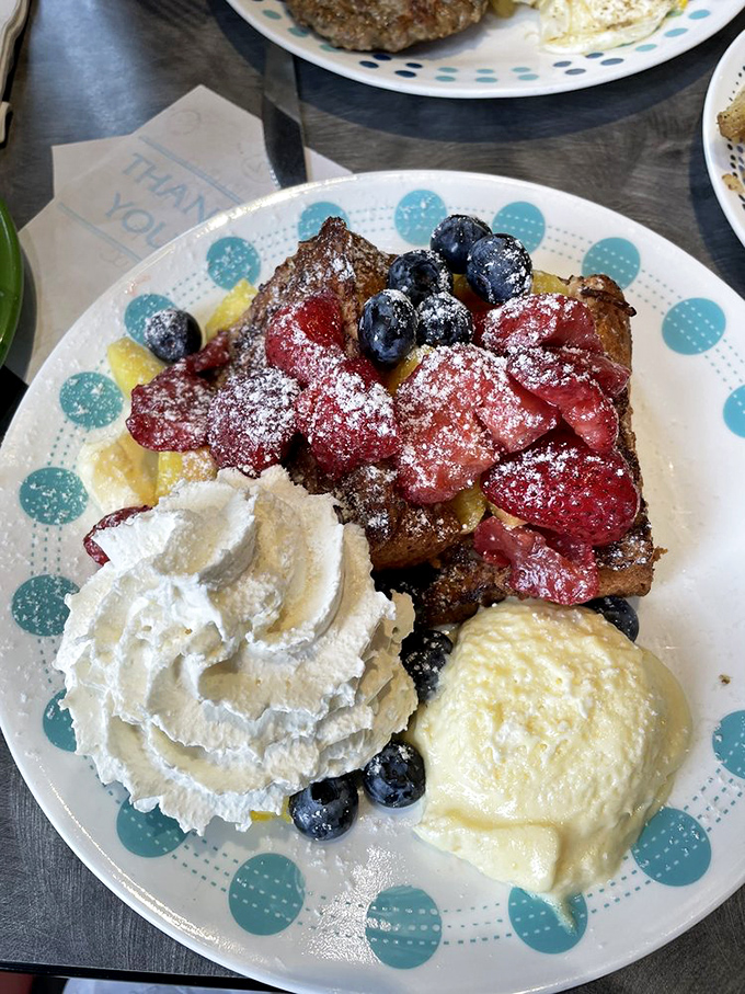 French toast that makes you question every other breakfast you've ever had. The berries aren't just toppings—they're jewels.