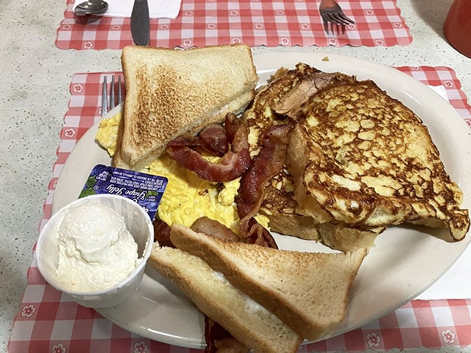 Breakfast perfection doesn't exi— wait, it does! Golden French toast, crispy bacon, and eggs that remind you why mornings were invented.