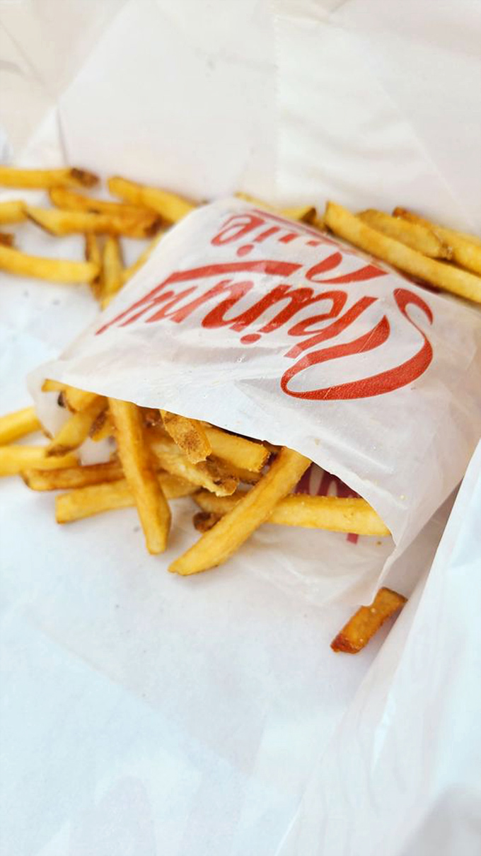 Golden, crispy, and perfectly salted—these fries aren't just a side dish, they're an essential supporting character in the Skinny Louie experience.