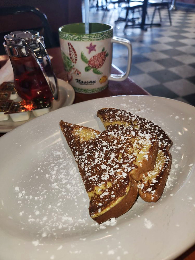 French toast dusted with powdered sugar like the first perfect snowfall of winter—a breakfast that makes you forget about your diet resolutions.