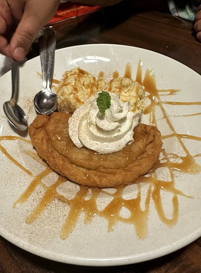 Dessert that makes you consider skipping the steak next time (but don't). This apple pie with ice cream isn't just served—it's presented like the finale of a delicious symphony.