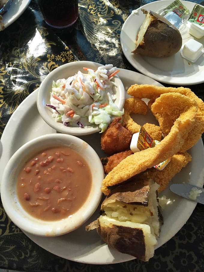 Golden fried catfish arrives with all the fixings, proving Missouri knows how to do comfort food right.