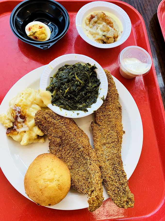 The holy trinity of Southern perfection: cornmeal-crusted catfish, mac and cheese that could make you weep, and greens cooked with such care they deserve their own ballad.