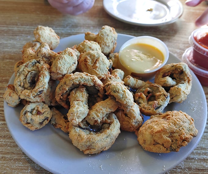 These golden-fried mushrooms aren't just appetizers – they're crispy preludes to seafood glory, with that perfect crunch-to-tender ratio that makes you forget vegetables were involved.