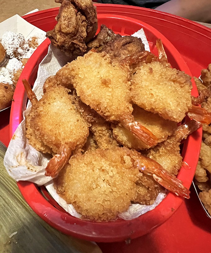 Fried shrimp so perfectly golden, they deserve their own trophy case. The crispy coating shatters with each bite, revealing sweet treasures within.