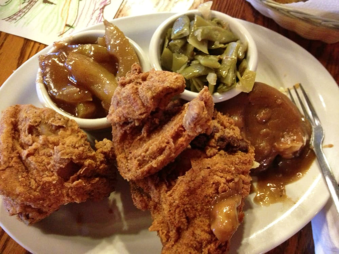 Fried chicken that would make your grandmother both proud and jealous. Those green beans and gravy aren't just sides—they're supporting actors deserving their own award.