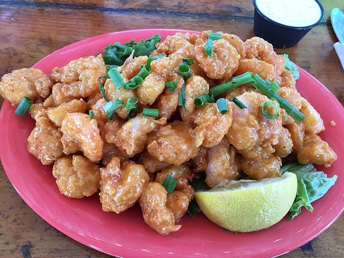 These aren't those sad frozen shrimp from the grocery store. These plump beauties are fried to golden perfection and dressed for success.