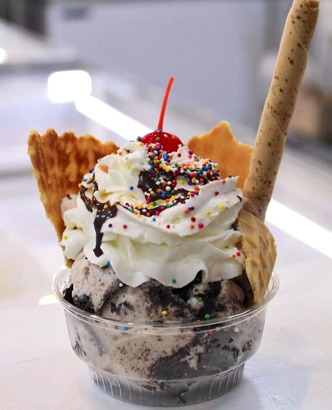 Ice cream architecture at its finest. This sundae doesn't just satisfy your sweet tooth—it throws a party for it.