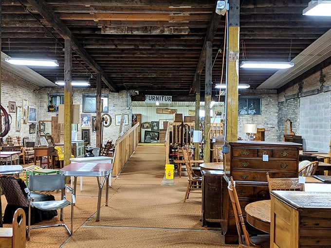 The furniture section feels like walking through America's living room history—exposed brick walls providing the perfect backdrop for yesterday's comfort.