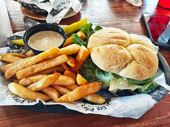 A sandwich that doesn't need fancy credentials—just honest ingredients and fries that could make a French chef weep with joy.