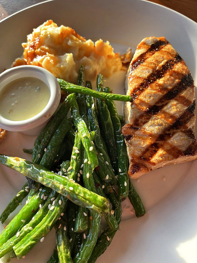 That perfect grill mark geometry on fresh swordfish isn't just for show – it's the visual promise of what your taste buds are about to experience.