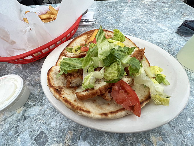 When Greek meets American diner culture, beautiful things happen - like this perfectly crafted gyro masterpiece.