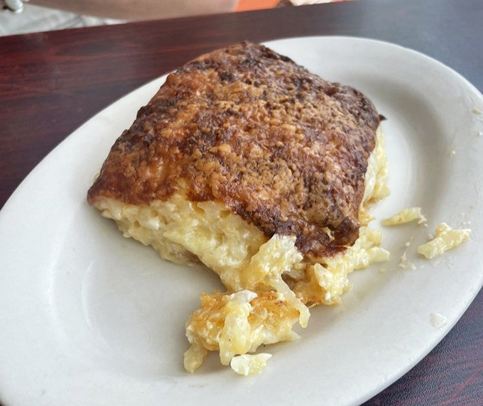 This isn't just an omelet—it's a fluffy golden monument to morning excellence. The kind of dish that makes you reconsider your relationship with eggs entirely.