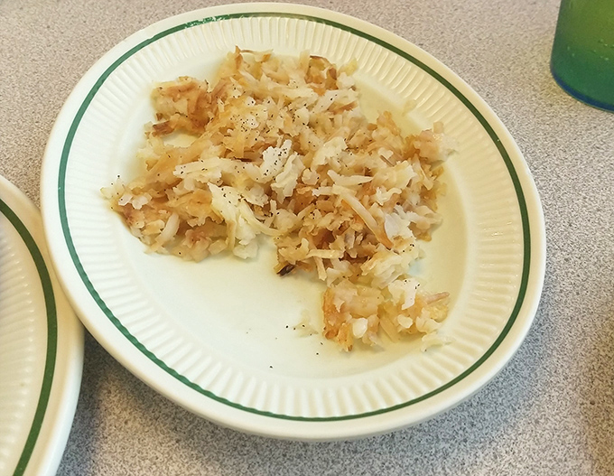 These aren't just hash browns—they're potato perfection. Crispy exterior, tender inside, and seasoned with what must be grandma's secret recipe.