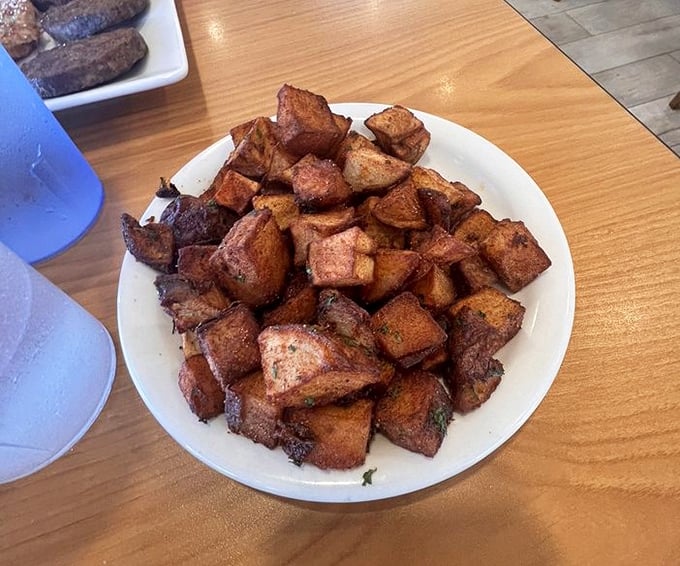 The legendary home fries in all their golden glory. These aren't just potatoes—they're little crispy cubes of breakfast perfection worth driving across state lines for.