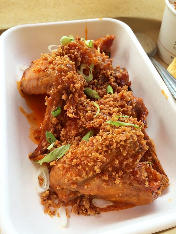 These wings, glazed in honey buffalo sauce and garnished with green onions, make traditional buffalo wings seem like they're not even trying.