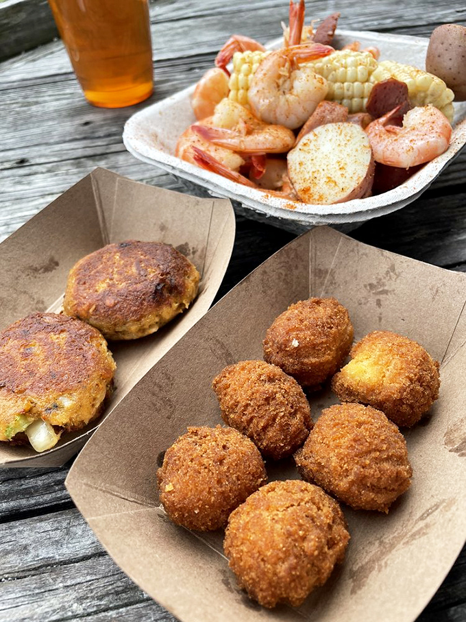 These aren't just hush puppies—they're golden orbs of happiness. Crispy outside, fluffy inside, and compelling enough to make you order seconds. 