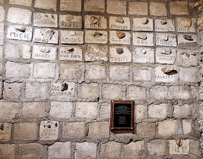 Each stone block tells a story—Andrews collected rocks from around the world, labeling their origins like a geographical scrapbook set in mortar. 