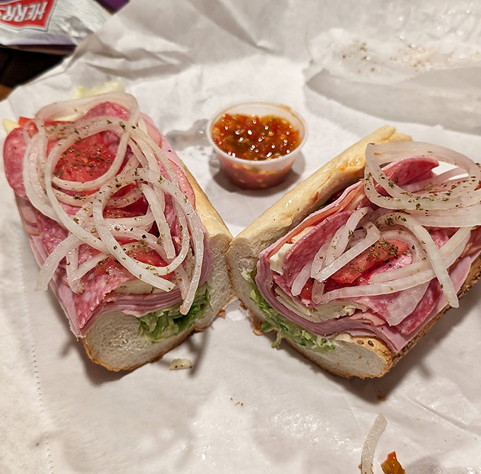 The Italian hoagie—where thinly sliced meats, sharp provolone, and crisp veggies create a symphony of flavors that would make Pavarotti weep.