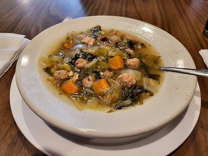 Italian Wedding Soup that would make any nonna proud – tiny meatballs swimming alongside vegetables in a broth that tastes like someone's been stirring it with love all day.