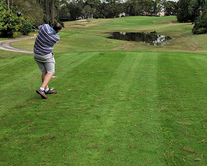 Golf in Hudson: where your slice might land in someone's backyard, but they're too relaxed to mind. 