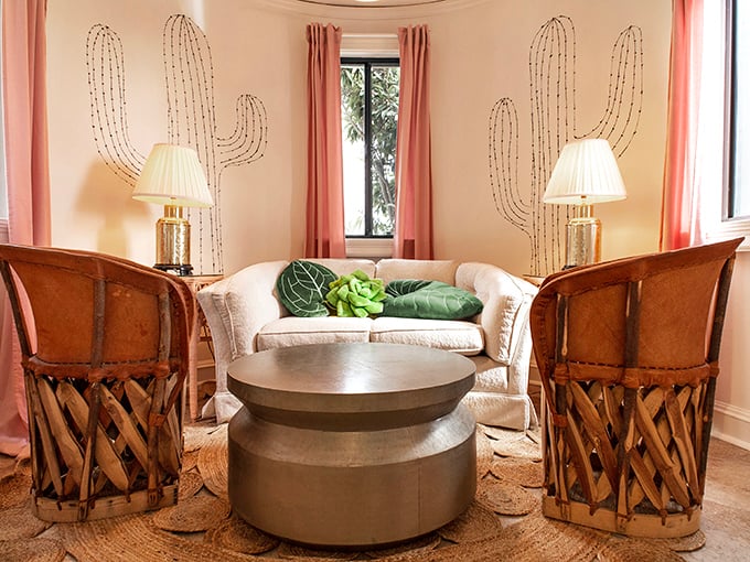 Cactus-themed elegance proves desert motifs can be sophisticated. Those leather equipale chairs would make any interior designer swoon.
