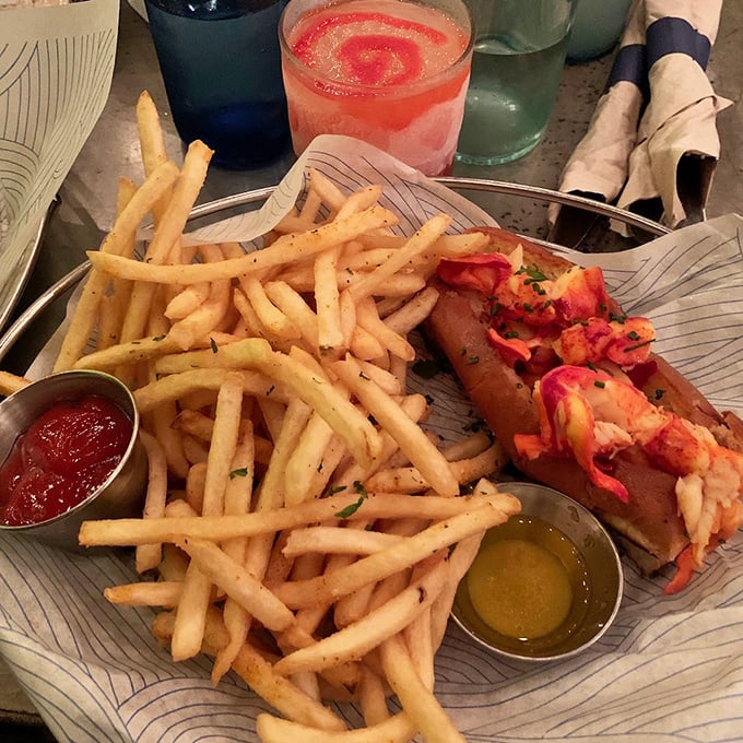 The perfect lobster roll doesn't exi— Oh wait, here it is! Buttery, overflowing, and demanding to be photographed before it disappears.