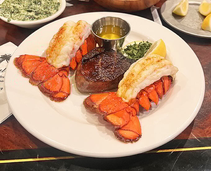 The surf and turf here isn't trying to impress Instagram—it's trying to impress your taste buds. Mission accomplished with these gloriously meaty lobster tails.