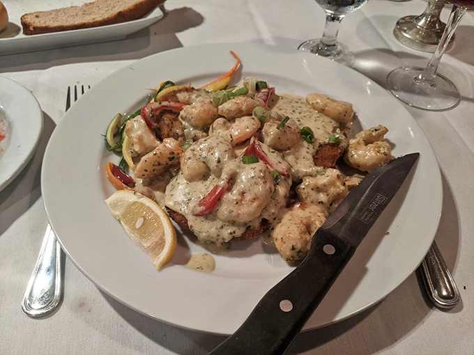 Louisiana meets Pennsylvania in this seafood symphony. Those shrimp aren't just swimming in sauce—they're doing the backstroke in creamy culinary bliss.