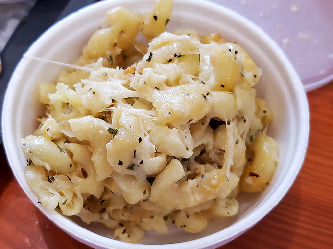Mac and cheese that doesn't just hug your soul—it gives it a full-on bear embrace. Those herbs aren't garnish; they're little flavor ambassadors.