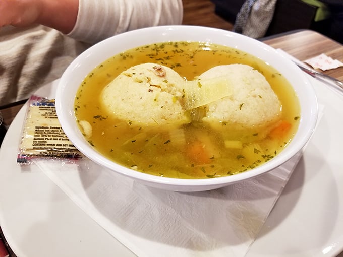 Matzo ball soup that could heal whatever ails you. Those fluffy dumplings float like clouds in a broth that tastes like someone's grandmother spent hours perfecting it.