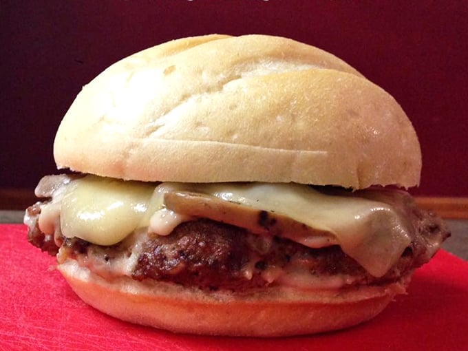 A burger that makes fast-food versions look like sad hockey pucks. The mushroom Swiss doesn't need Instagram filters—it's the real photogenic deal
