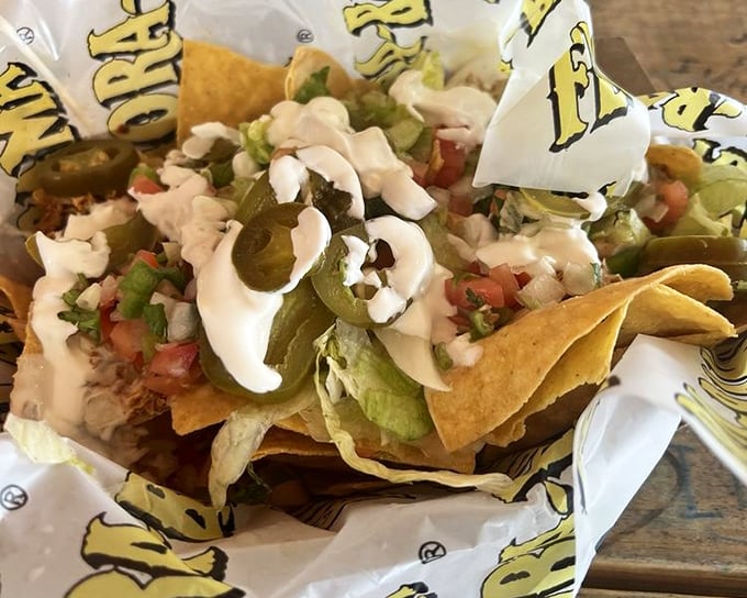These nachos aren't just loaded—they're carrying emotional baggage from all the other inferior nachos you've ever encountered.