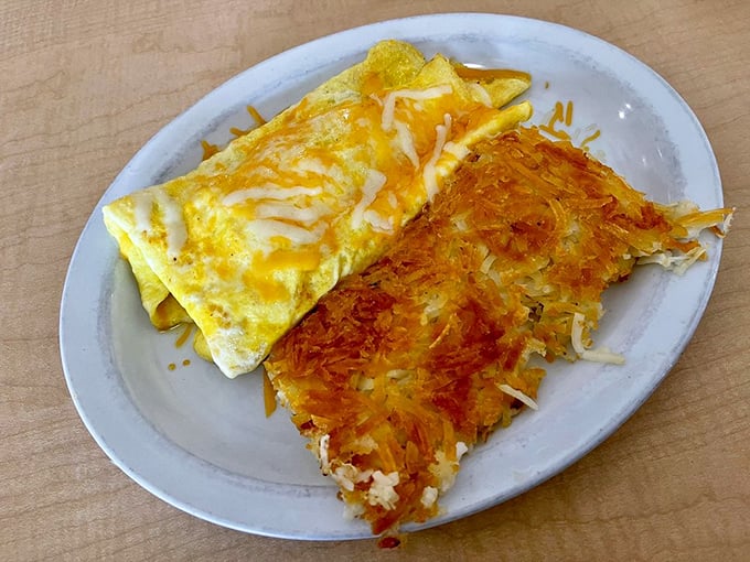 The perfect omelet-hash brown duo is like a well-matched couple—each maintaining their own identity while making the other better just by being nearby.