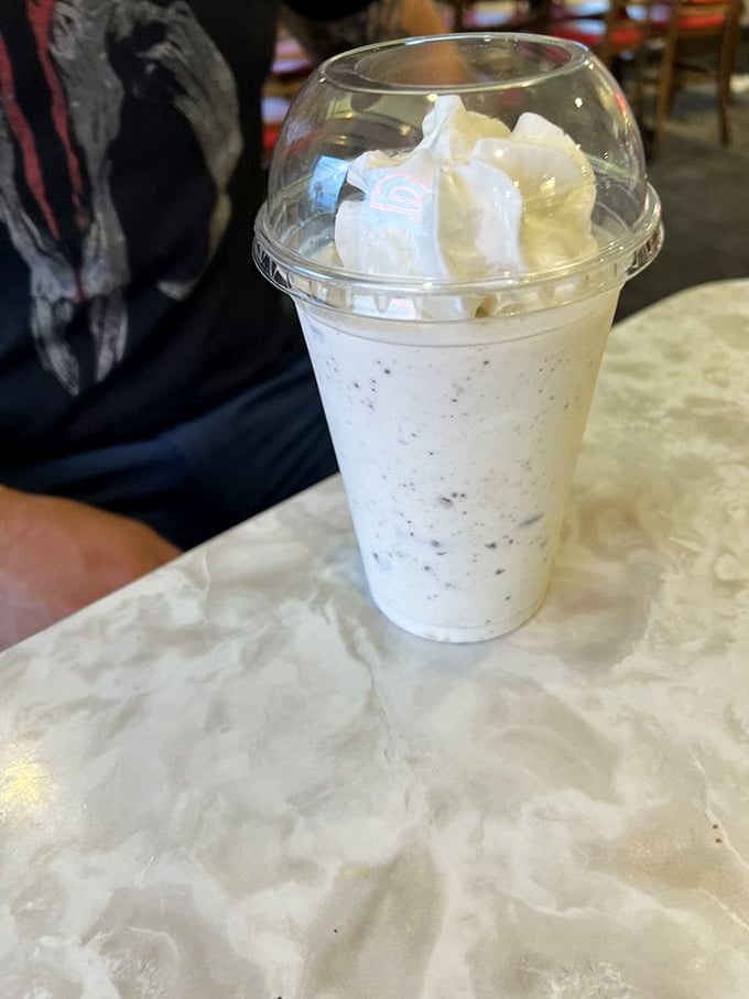 The Oreo milkshake arrives like a cloud of nostalgia in a cup—thick enough to challenge your straw but worth every delicious effort.