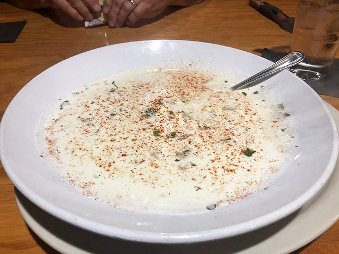 This isn't just soup—it's a warm hug in a bowl. The oyster stew's velvety broth, flecked with herbs and spice, whispers "comfort" with every spoonful. 