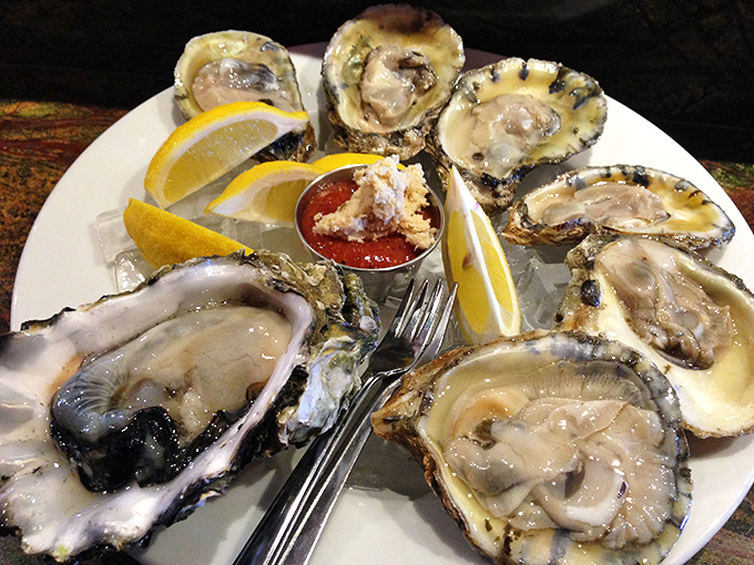 Fresh oysters on the half shell—nature's perfect appetizer. Like little pools of ocean happiness waiting for a squeeze of lemon.