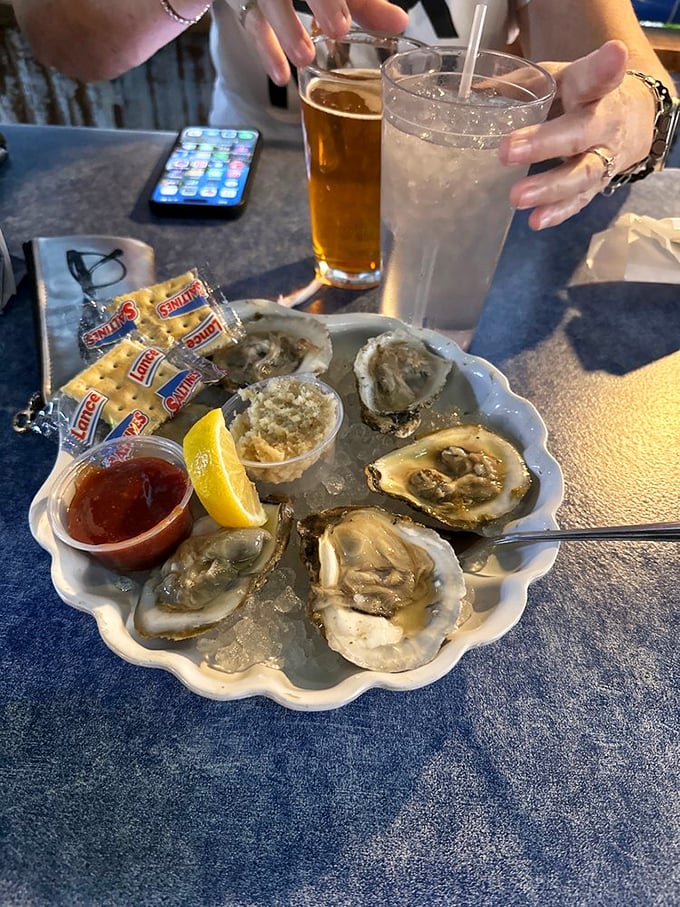 These oysters aren't just served—they're presented on a throne of ice, ready for their lemon squeeze coronation ceremony.