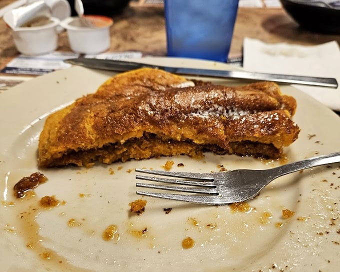These aren't just pancakes—they're edible sunshine. Golden-brown, perfectly caramelized, and hiding a cinnamon treasure within that would make pirates jealous.