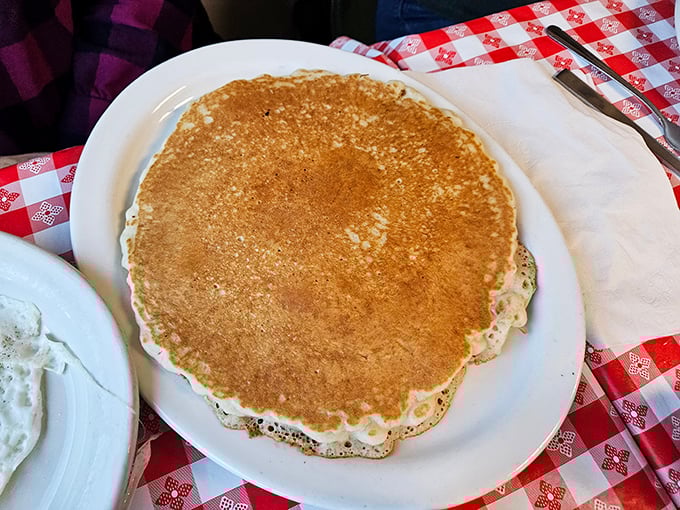 Pancakes at Angie's achieve that mythical balance: golden-brown exterior giving way to a fluffy interior that absorbs syrup like it was designed by NASA.