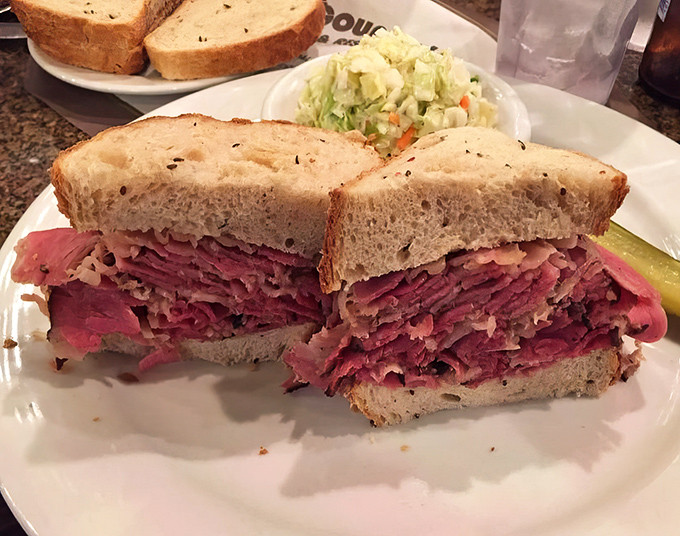 Behold the architectural marvel that is the pastrami sandwich—a skyscraper of meat that would make Manhattan jealous.