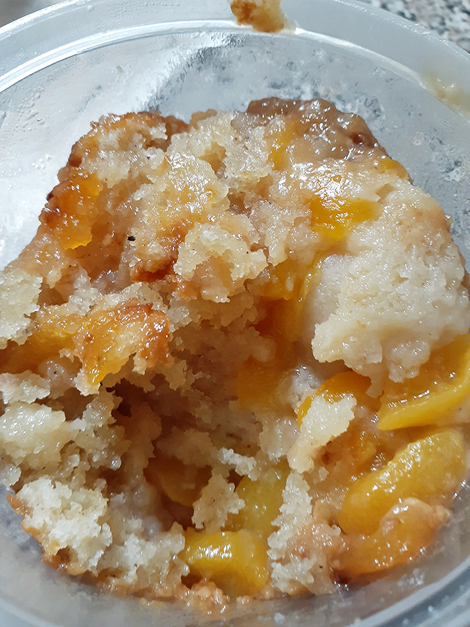 Peach cobbler that strikes the perfect balance between fruit and buttery crust. The kind of dessert that makes you consider skipping the main course.