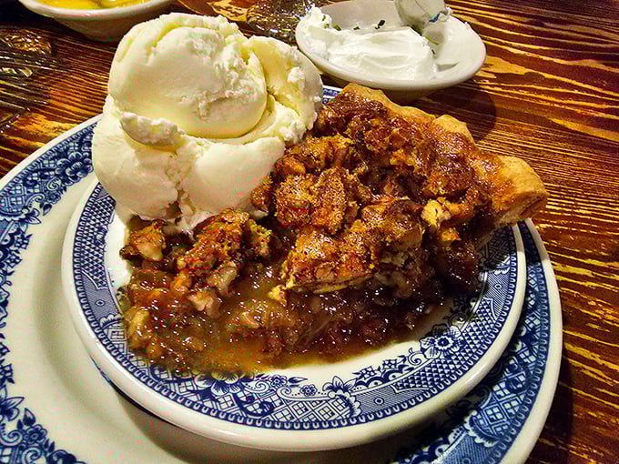 This isn't just apple pie – it's what apple pie dreams of becoming when it grows up. That scoop of vanilla ice cream is having the time of its life.