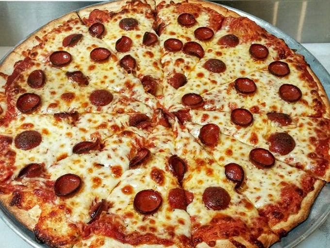 Pizza perfection doesn't need fancy toppings. This pepperoni pie proves that classics become classics for a reason—they're irresistible.