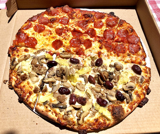 Half pepperoni, half mushroom and olive – this isn't just pizza, it's diplomatic genius for indecisive dinner companions.